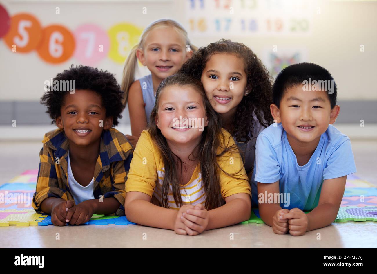 Education, portrait or happy children in classroom learning or smiling ...