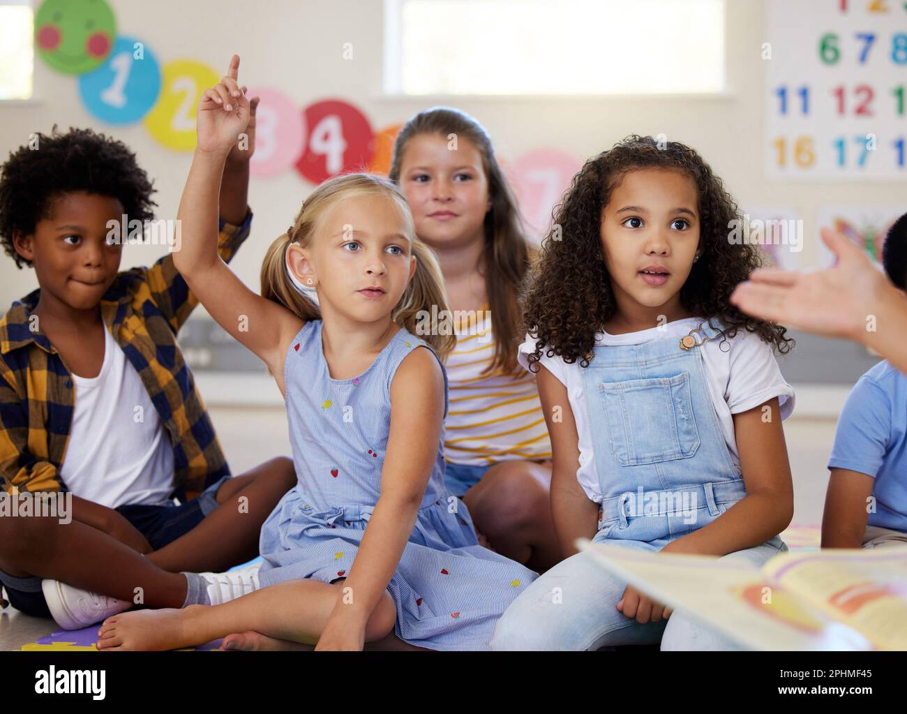 Teacher, hands up or kids in classroom learning, test or studying with ...