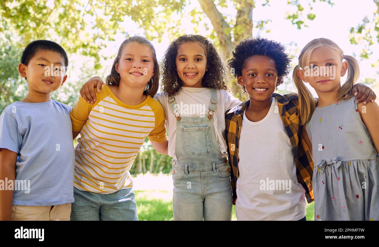Portrait, kids and a group of friends standing in a line together ...