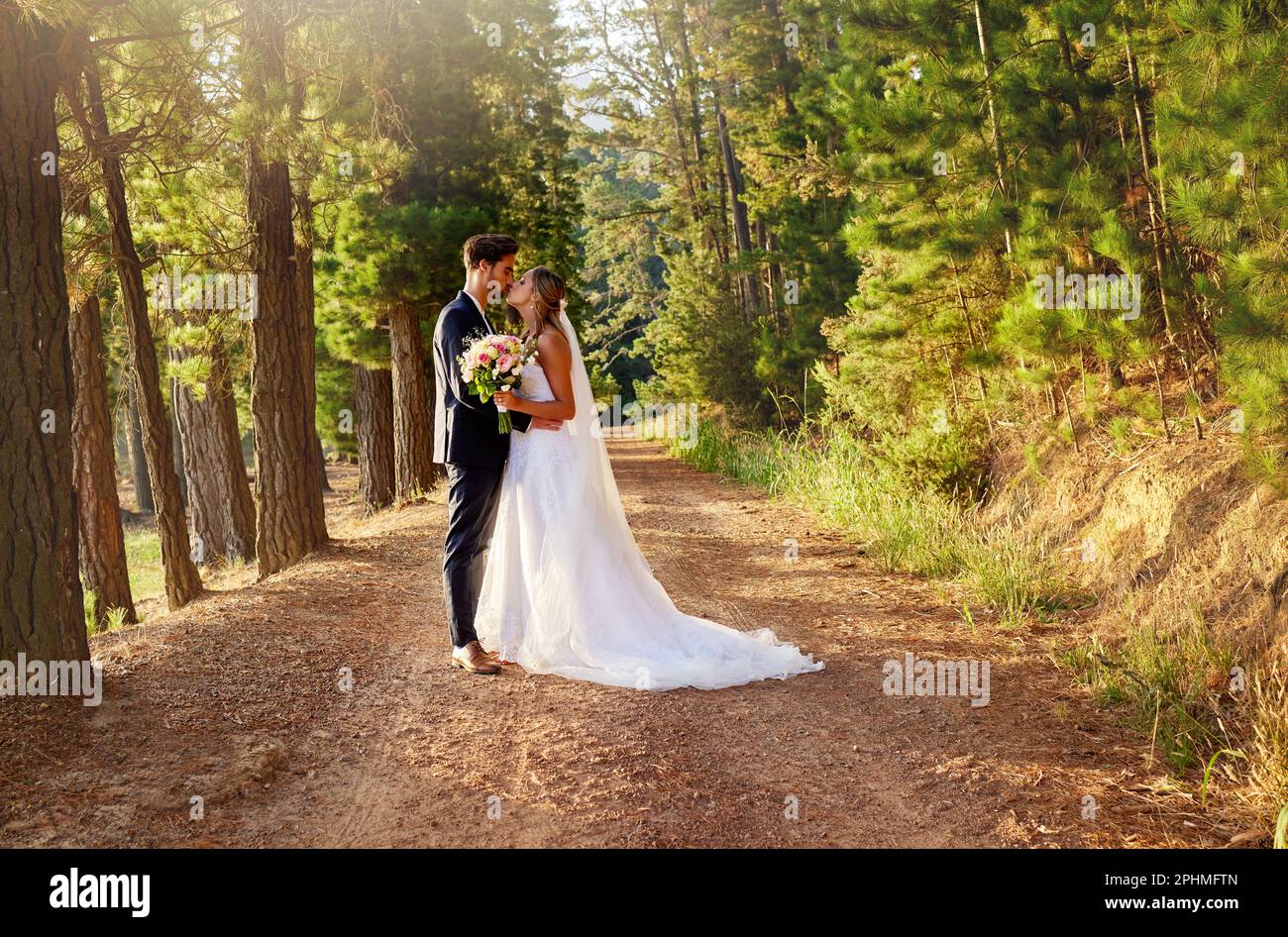 Wedding, married and couple kiss in forest, garden and nature for ...