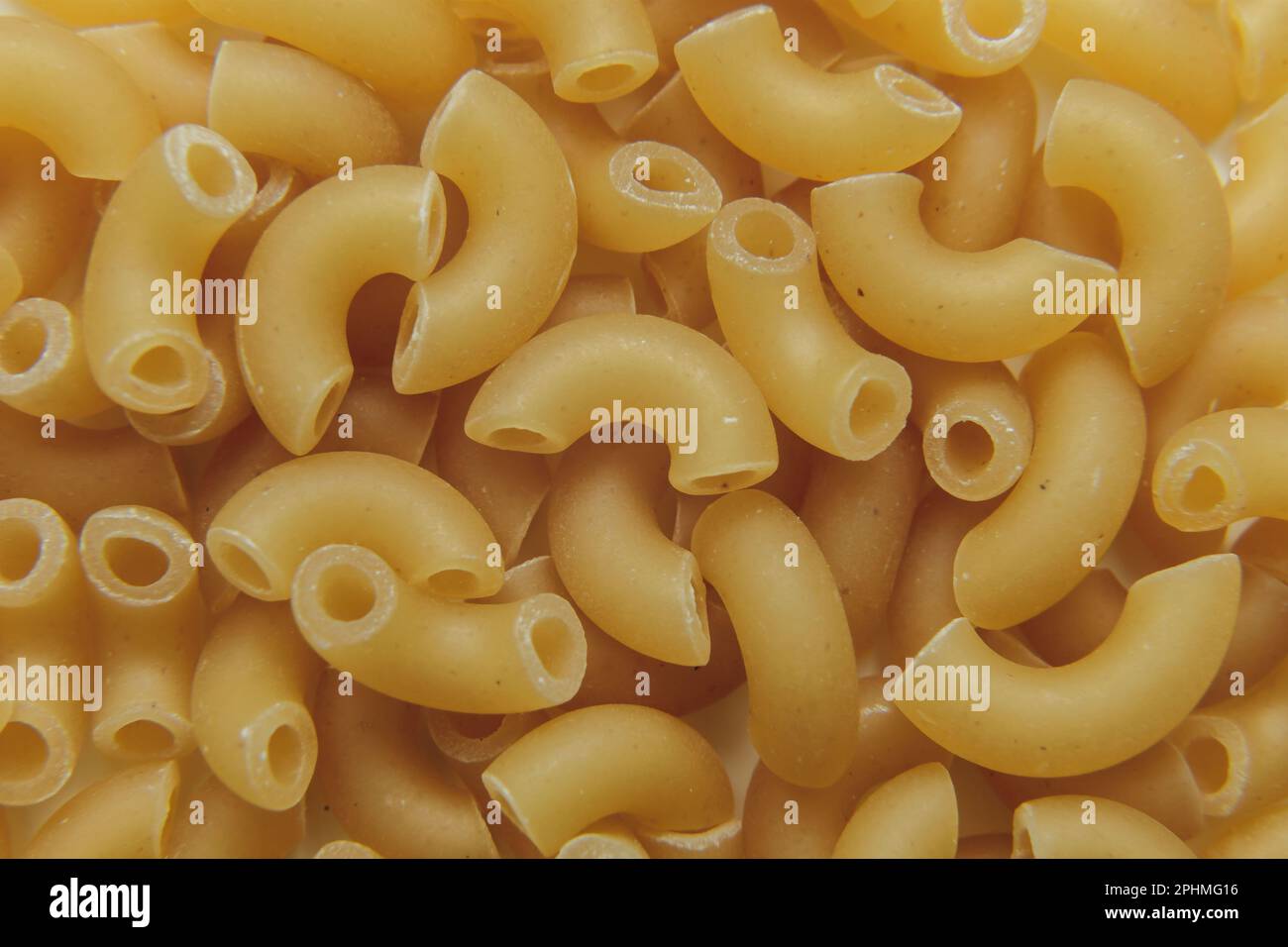 Dry raw horn pasta texture made from durum wheat , macro photo, pasta ...
