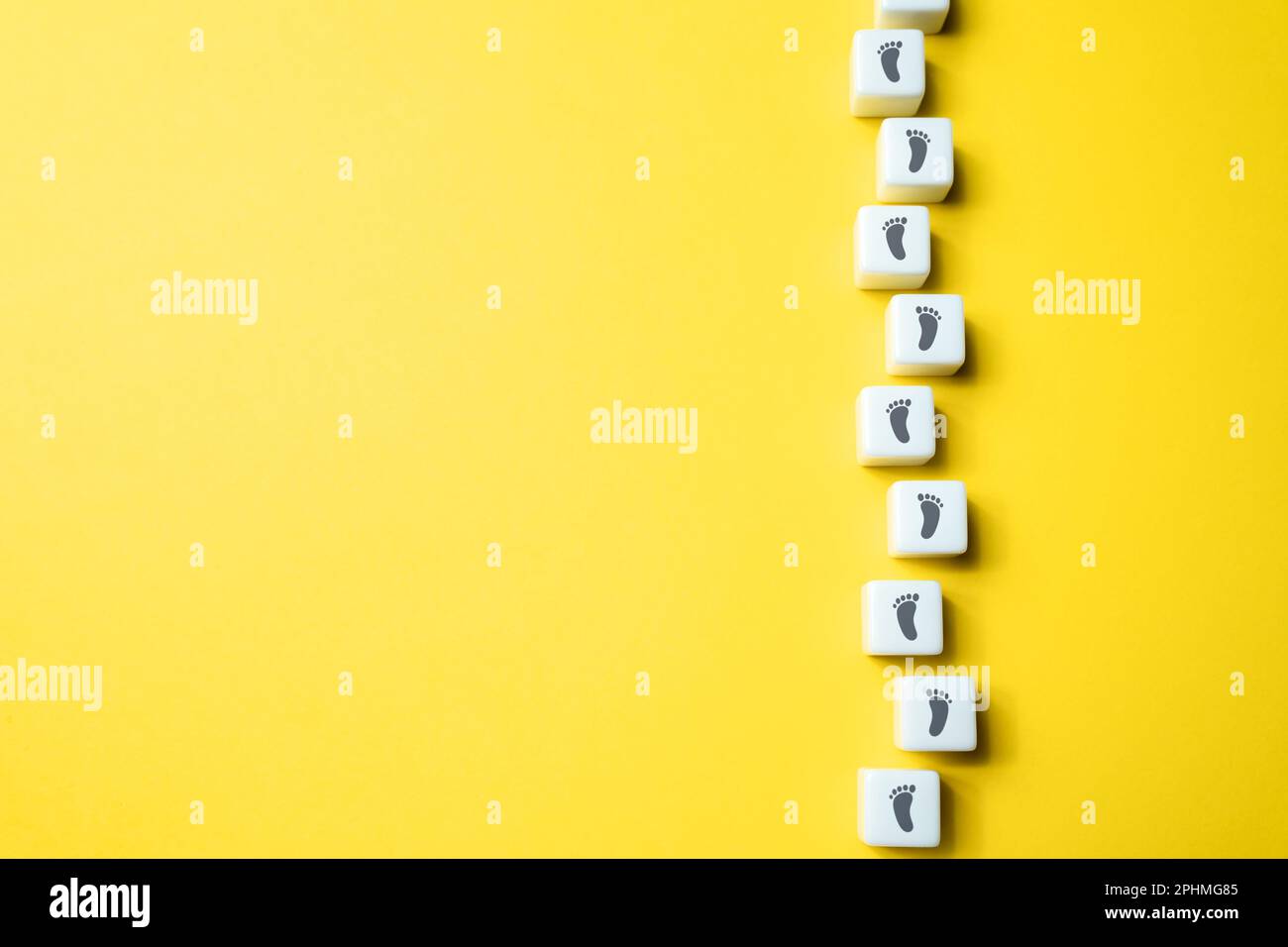 Direction from footprints on blocks. Progress and success are achieved ...