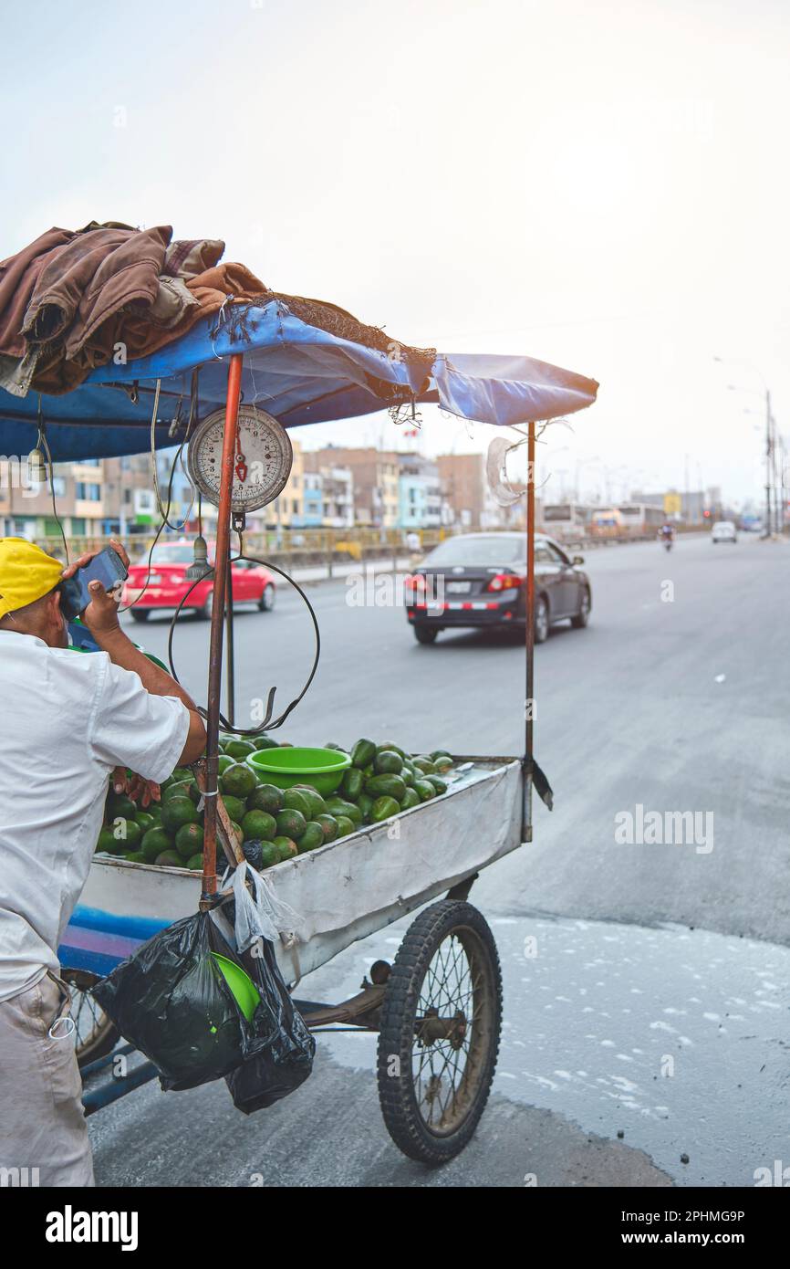 Mobile street vendor selling avocado, aguacate, palta. A Avocado cart ...