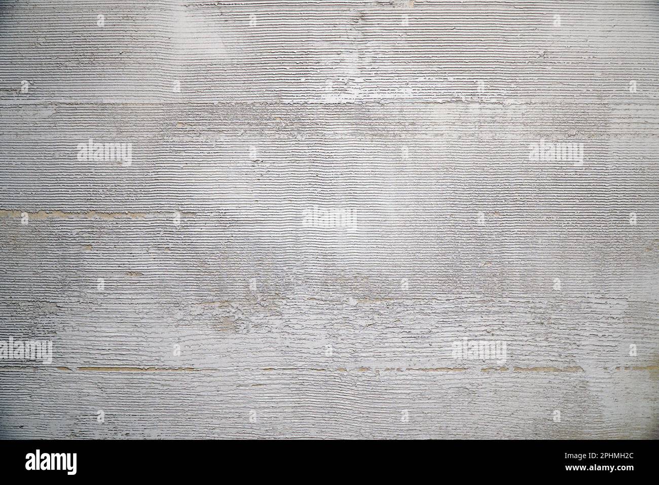 Gray decorative plaster on the wall with pressed horizontal stripes ...