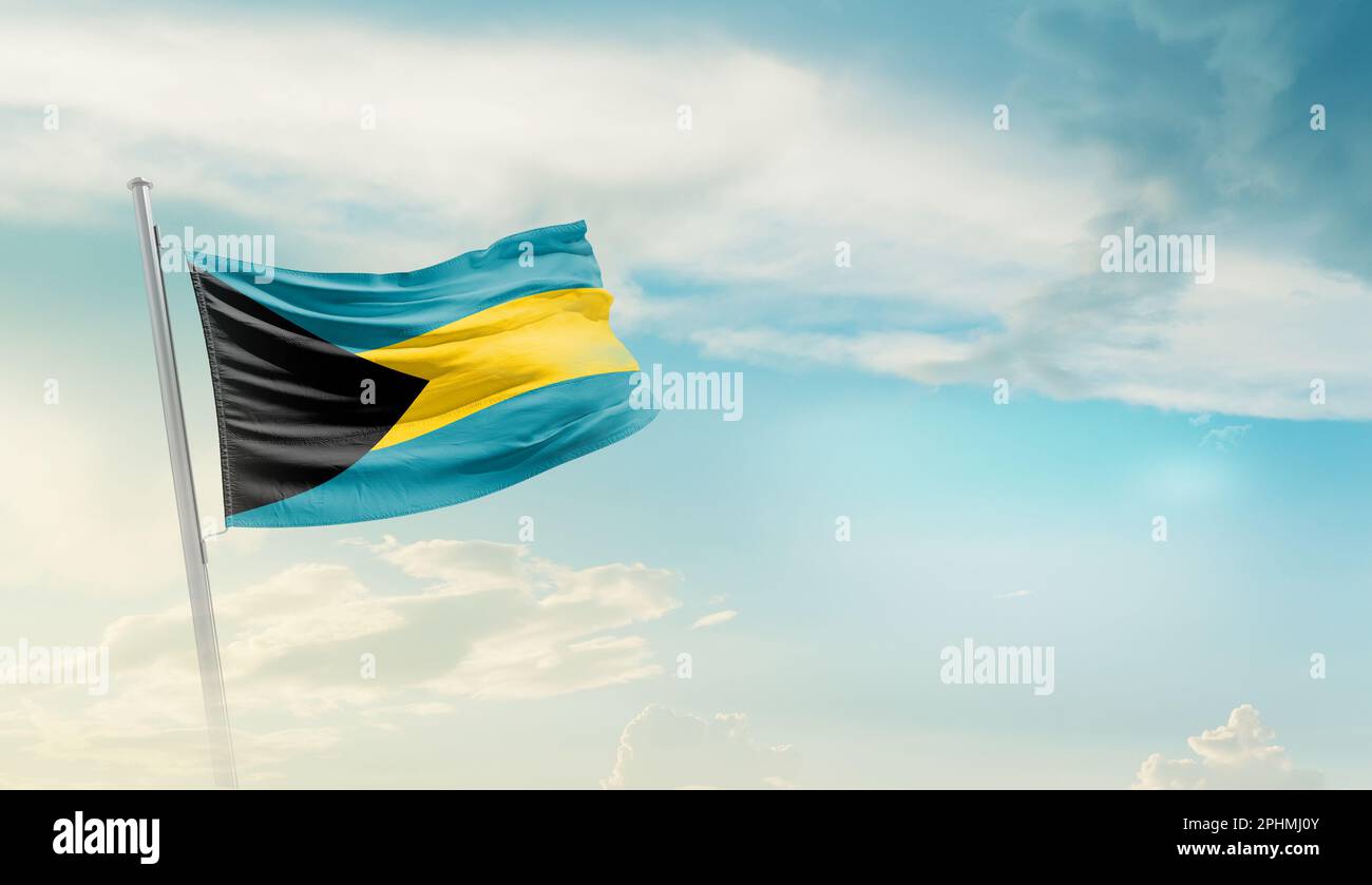 The Bahamas waving flag in beautiful sky Stock Photo - Alamy