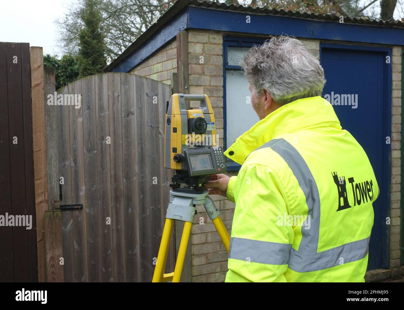 A Land Surveyor carries out his work with a Total Station or Theodolite ...