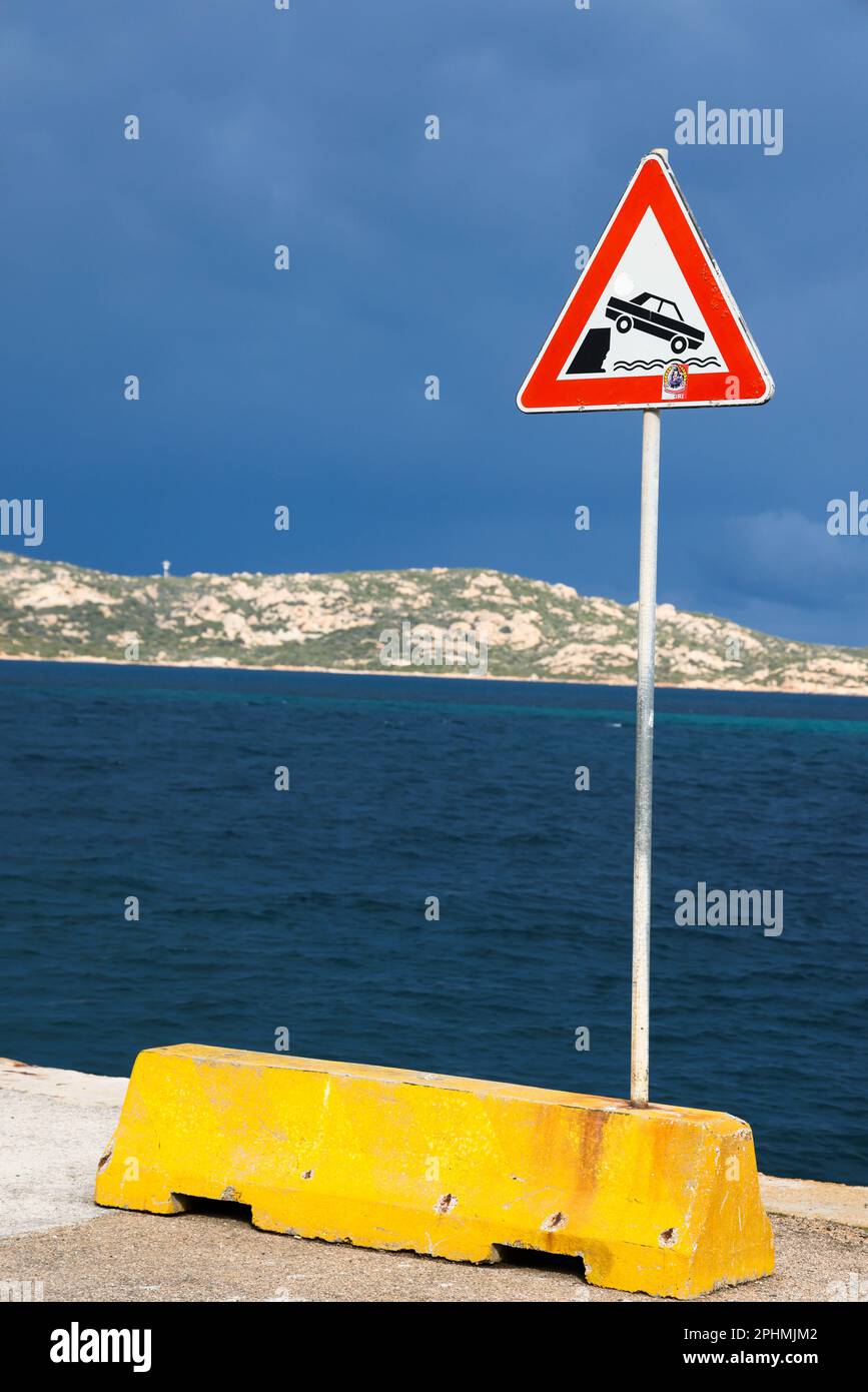 Warning triangle traffic sign of unprotected quayside and danger ...