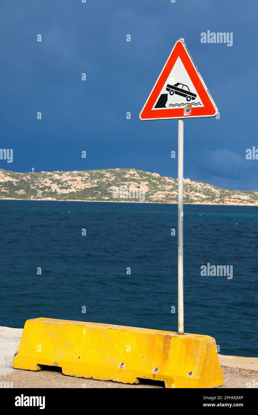 Warning triangle traffic sign of unprotected quayside and danger ...