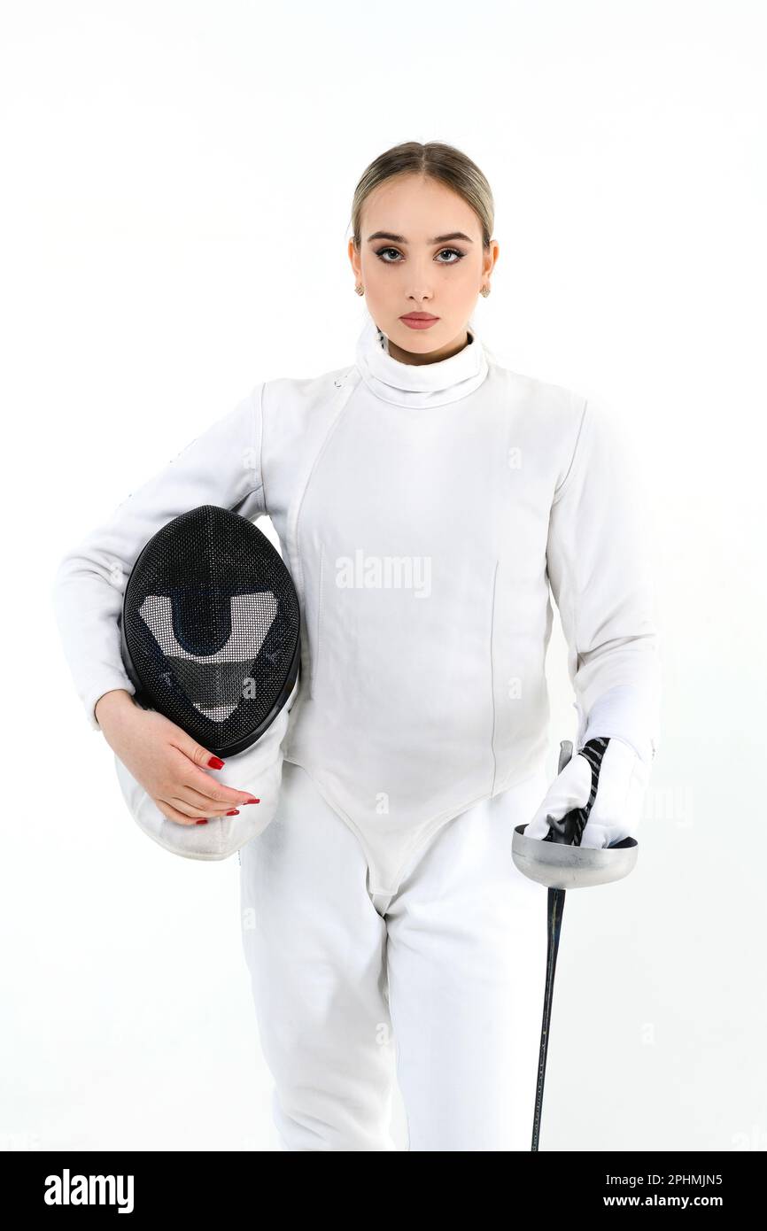 Girl fencer with a sword on a white background. Portrait of a girl in a ...