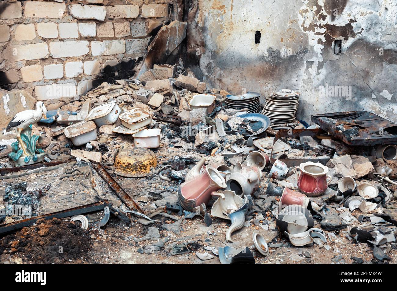 Kitchen utensils that were scattered by the explosion can be seen in ...