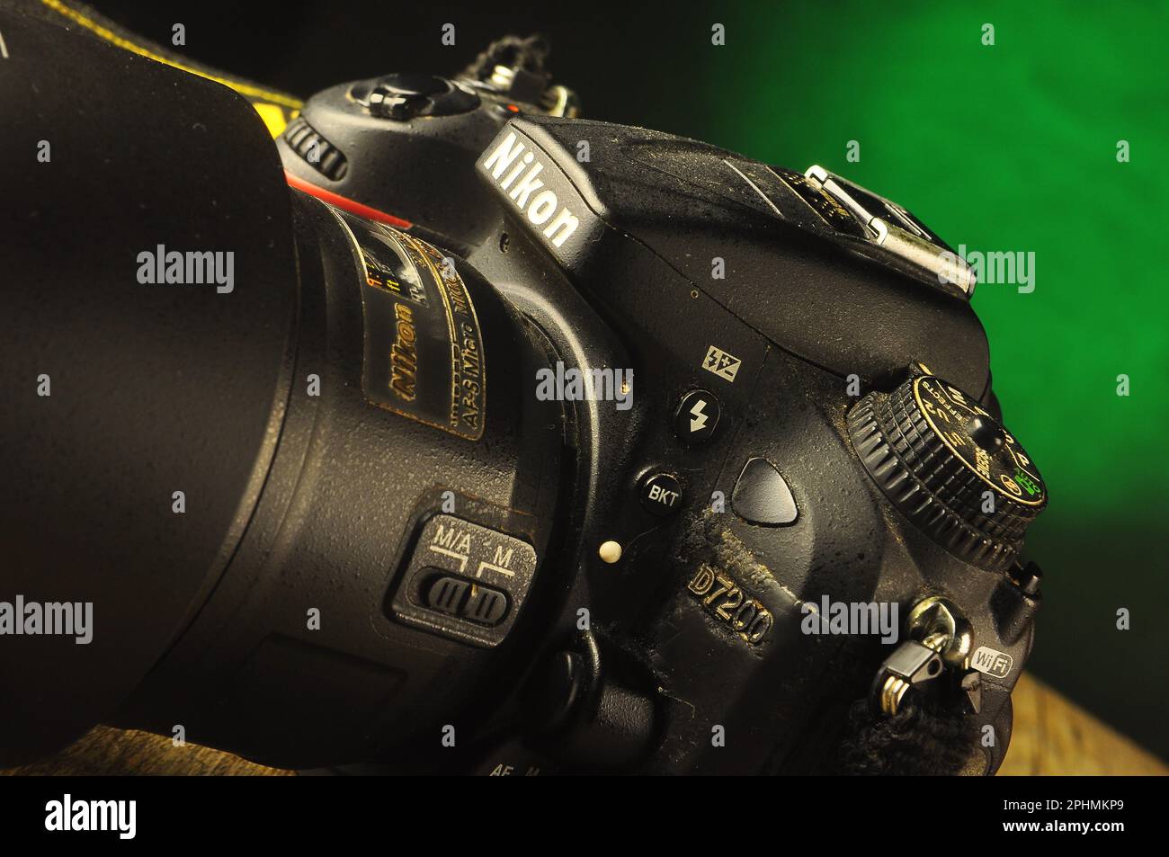 camera d 7200 with 60 lens over green background Stock Photo - Alamy