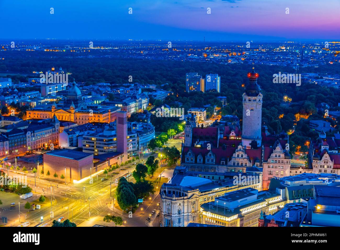 Sunset panorama view of the new town hall and its neighborhood in ...