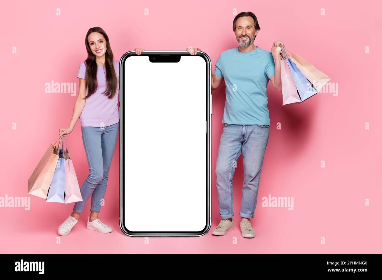 Full body portrait of two people hold boutique packages empty space ui ...