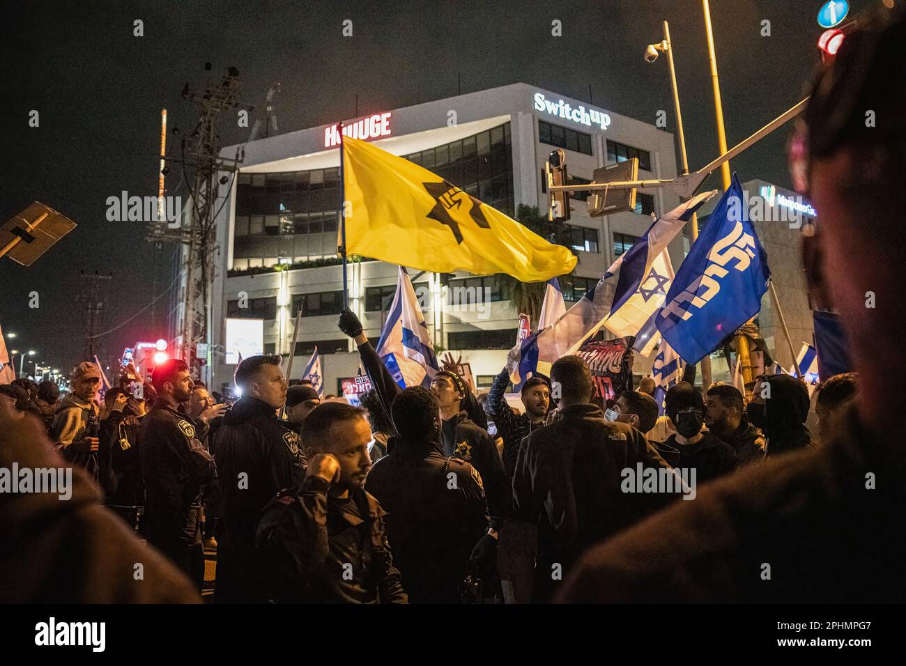 Tel Aviv, Israel. 25th Mar, 2023. Pro-reform protestors wave the Likud ...