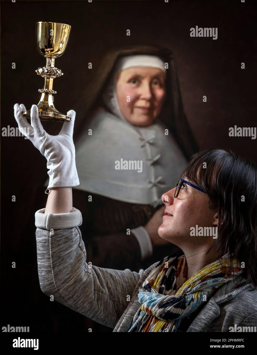 Special collections manager Dr Hannah Thomas holds the 1630s recusant ...