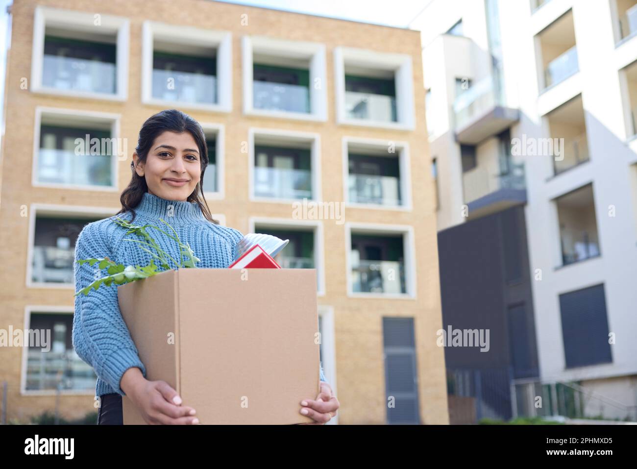 Portrait Of Female University Or College Student Outdoors Moving Into ...