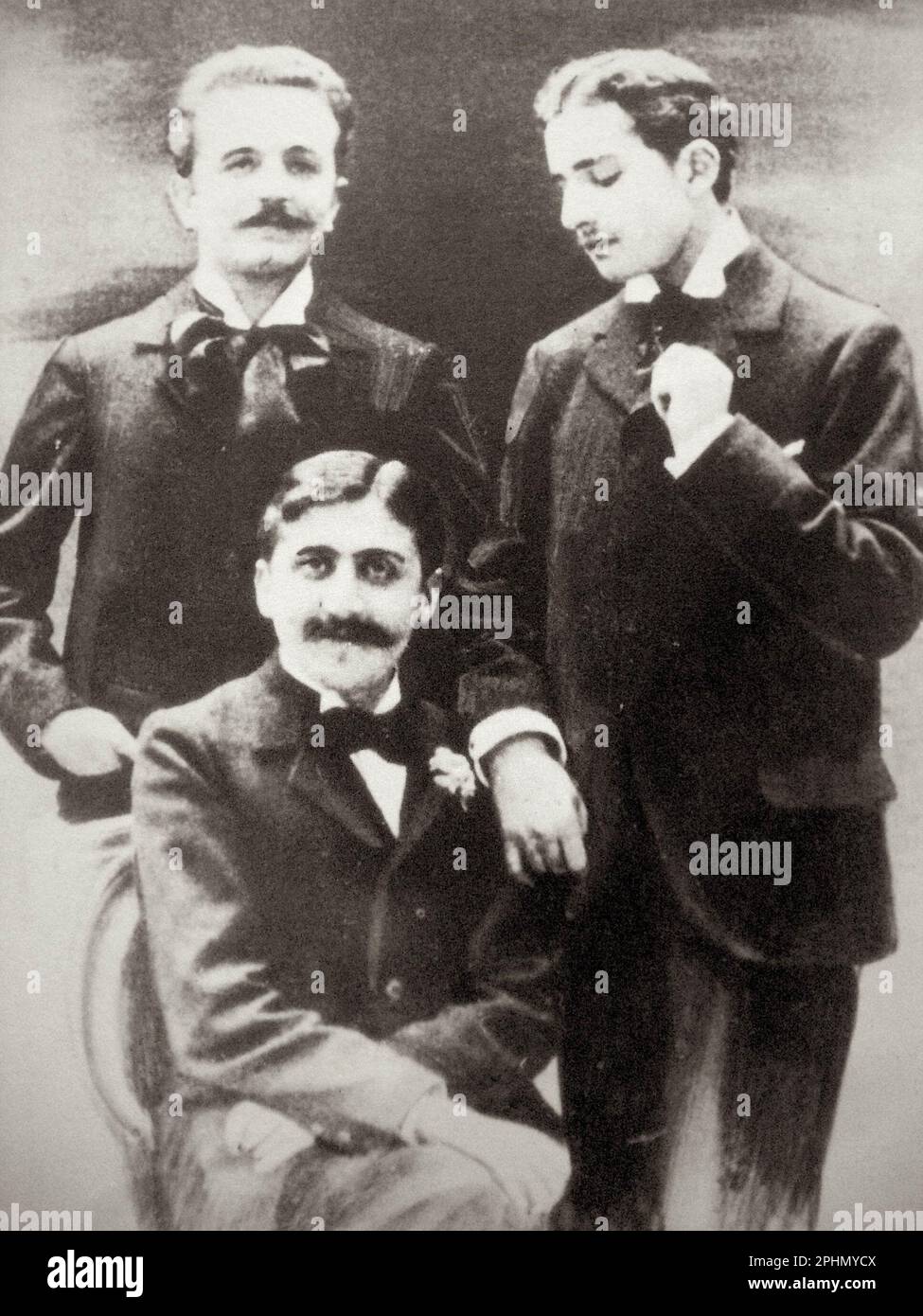 Marcel Proust (seated), Robert de Flers (left), and Lucien Daudet ...