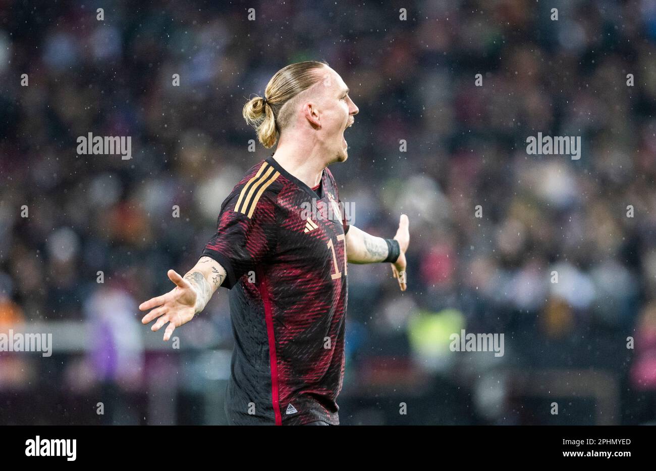 Koeln, RheinEnergieStadion, 28.03.23: Marius Wolf of Germany reacts ...