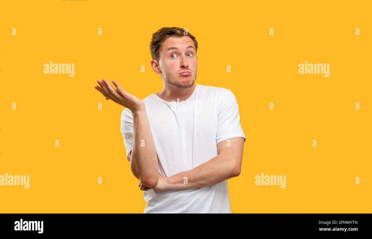 clueless man portrait no idea doubtful guy shrug Stock Photo - Alamy
