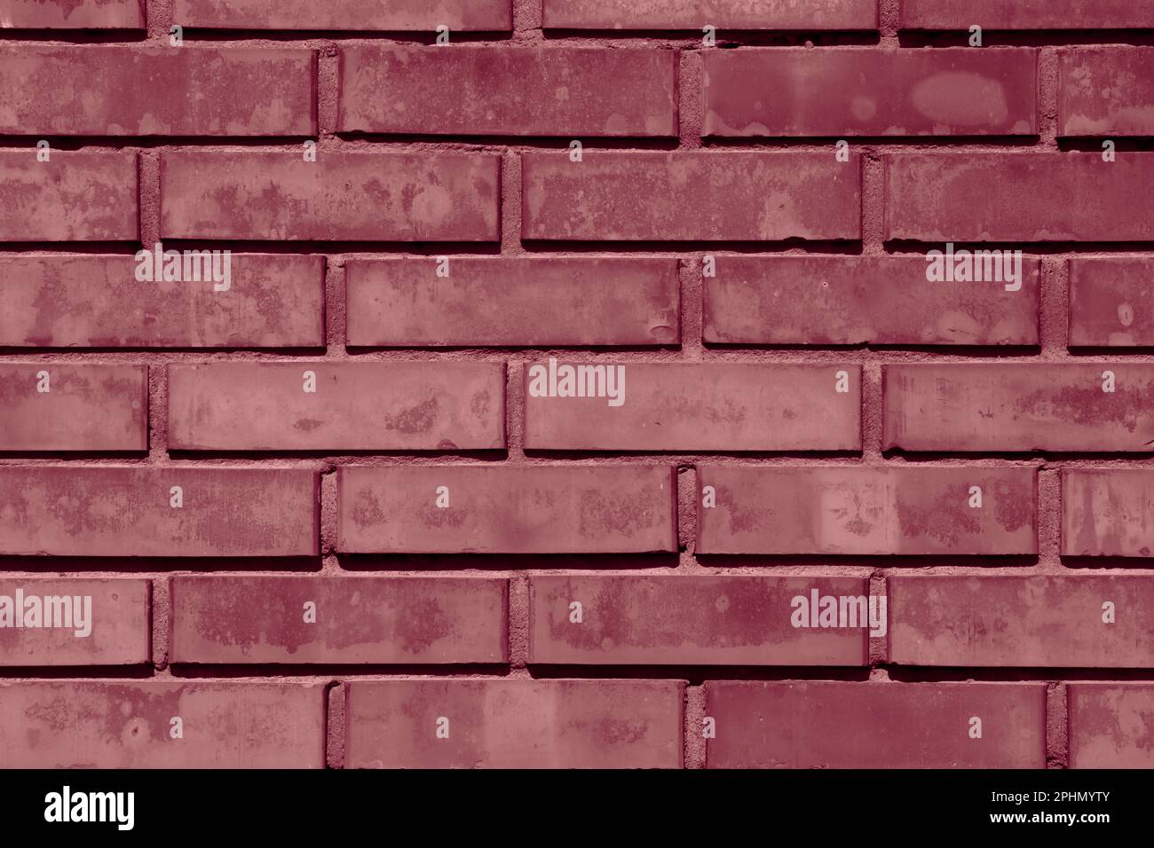 brick stone wall background colored in cordovan color Stock Photo - Alamy