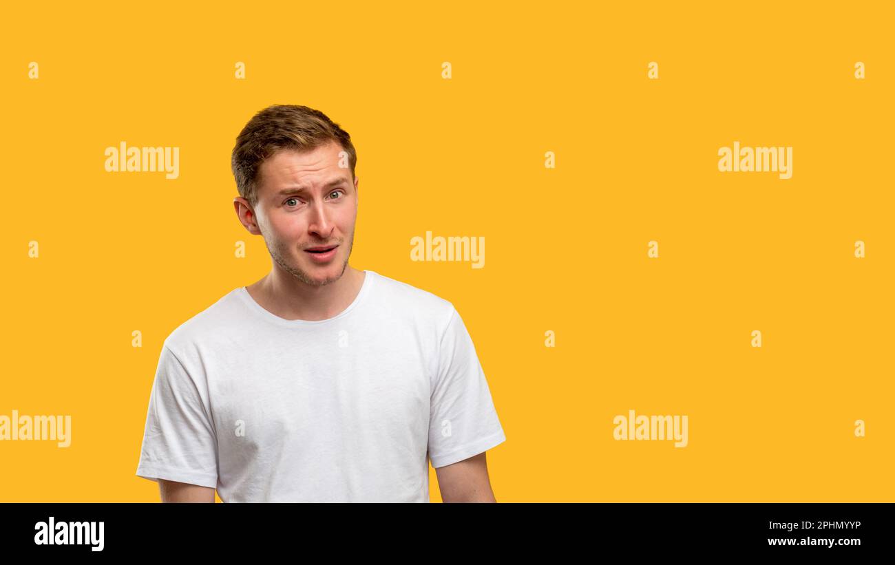 shocked man portrait ad background doubtful guy Stock Photo - Alamy