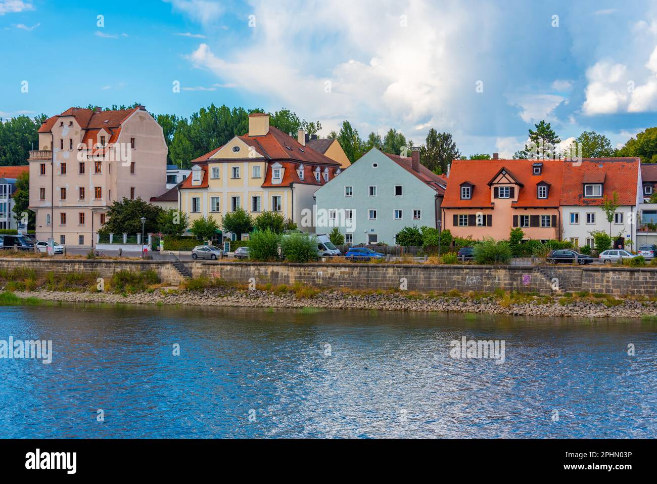 Colorful houses at waterfront of Danube river in Regensburg, Germany ...