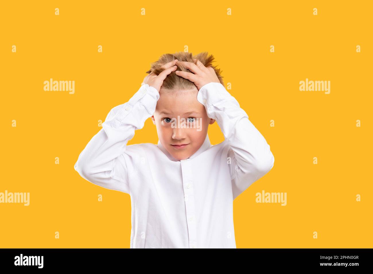 shocked child portrait panic overwhelmed boy Stock Photo - Alamy