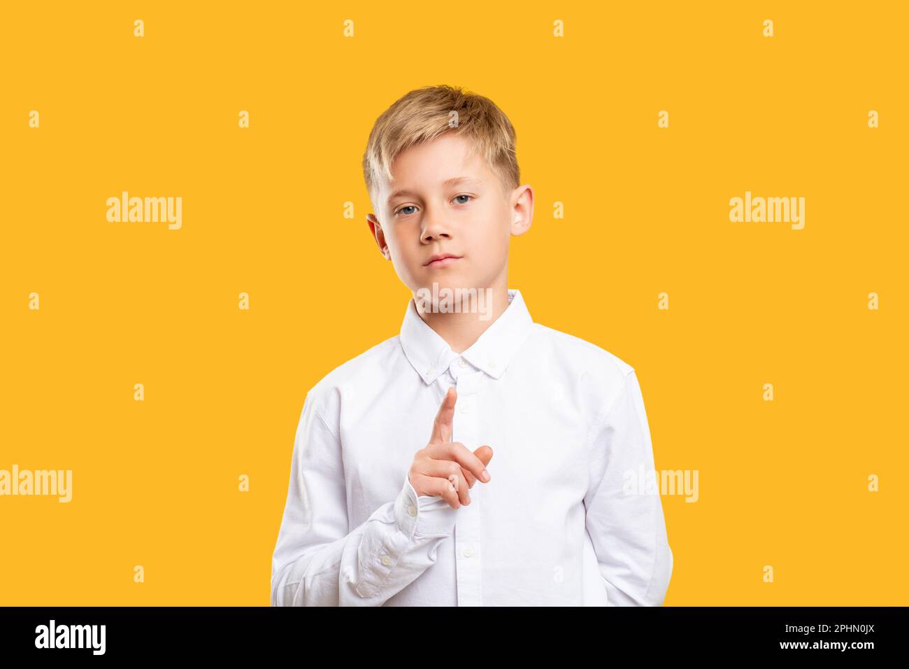 denial gesture confident boy warning finger orange Stock Photo - Alamy