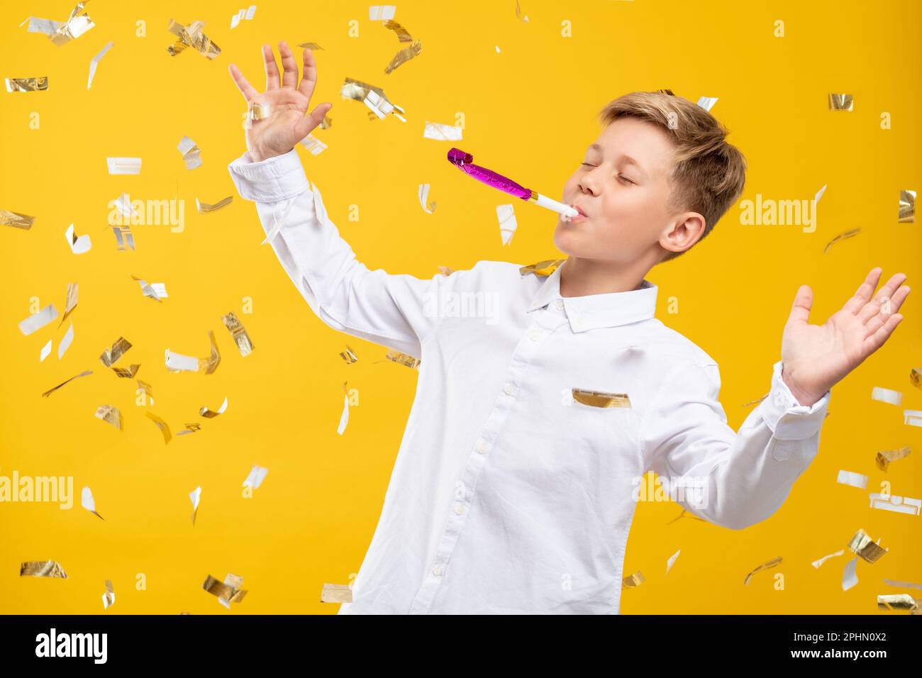 birthday boy portrait fun celebration party horn Stock Photo - Alamy