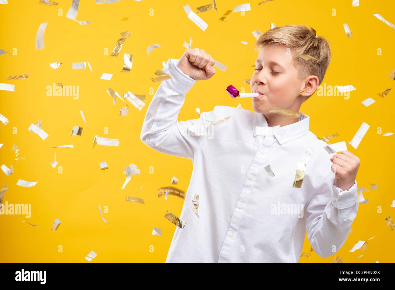 birthday boy portrait happy dancing confetti rain Stock Photo - Alamy