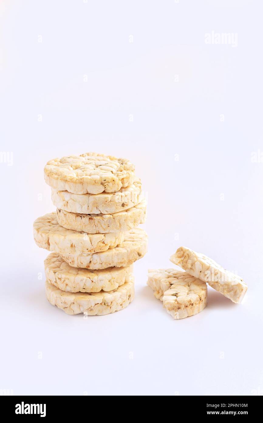 Stack of puffed rice cakes isolated on white background. Healthy snacks ...