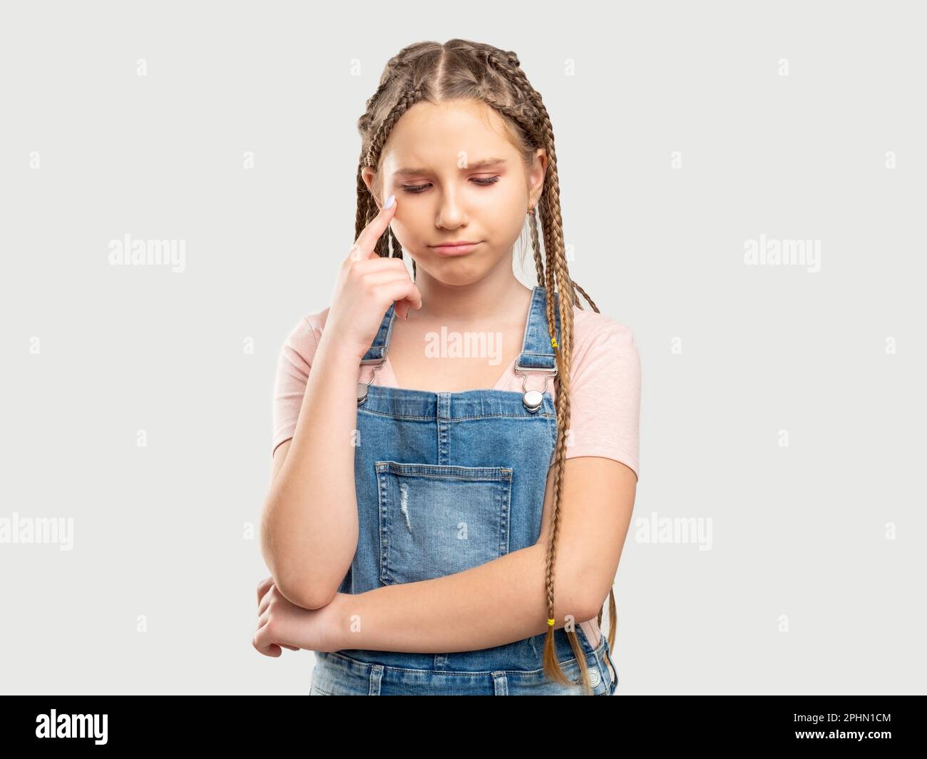 upset girl portrait offended child looking down Stock Photo - Alamy