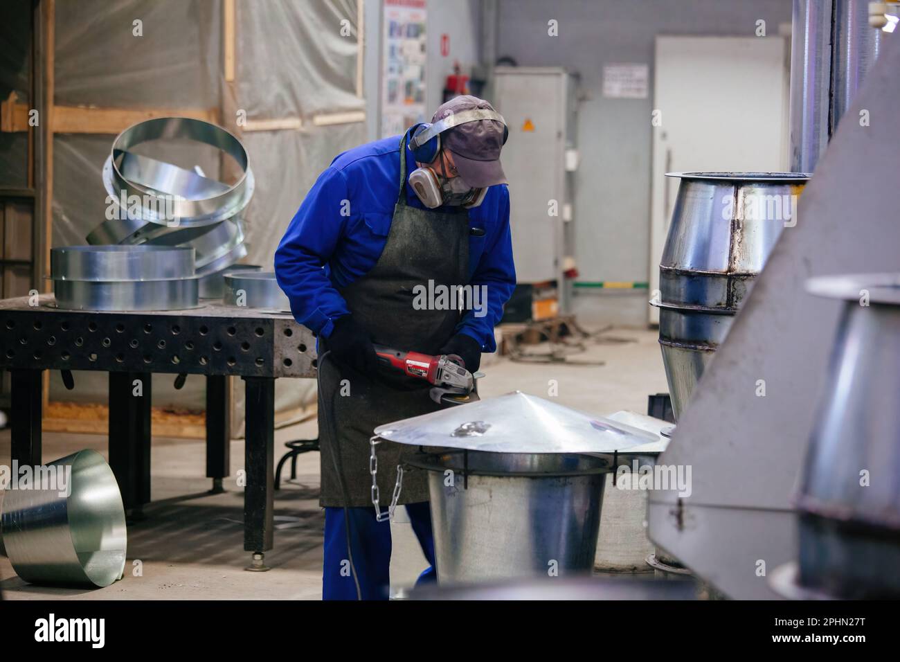Industrial worker cutting steel duct hi-res stock photography and ...