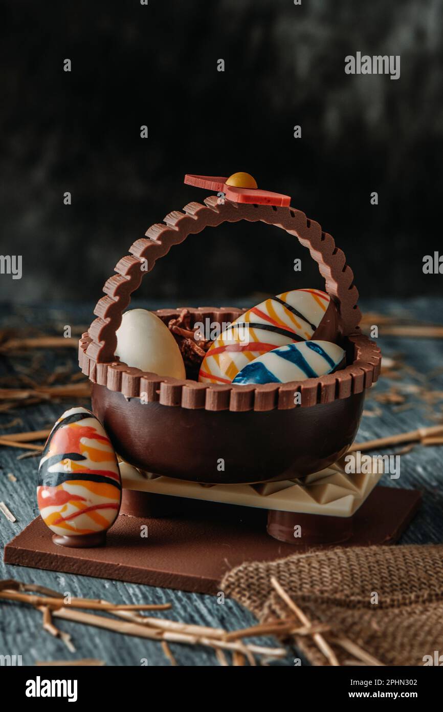 closeup of a chocolate basket with eggs as a spanish mona de pascua, a ...