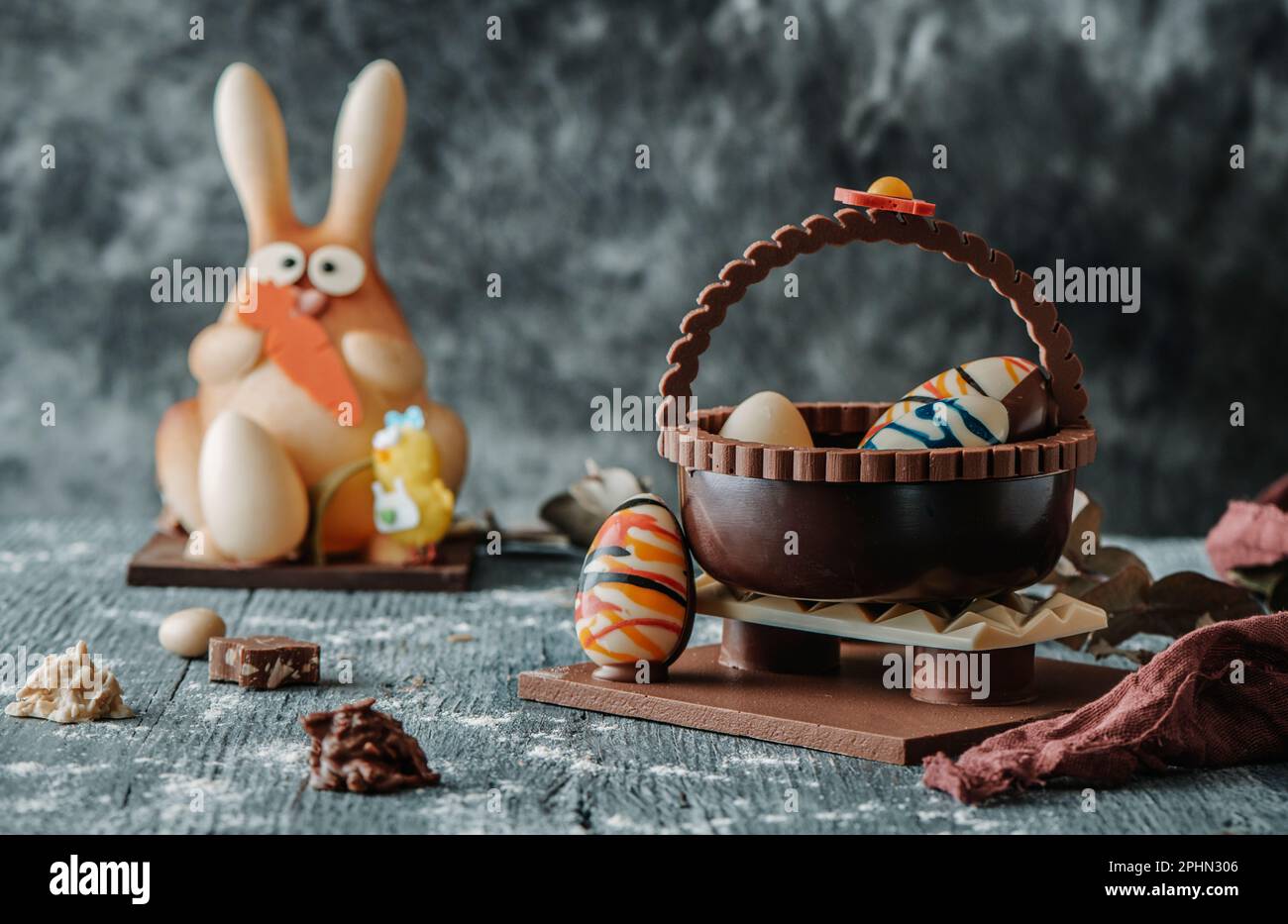 a chocolate easter bunny and a chocolate basket with eggs as a spanish ...