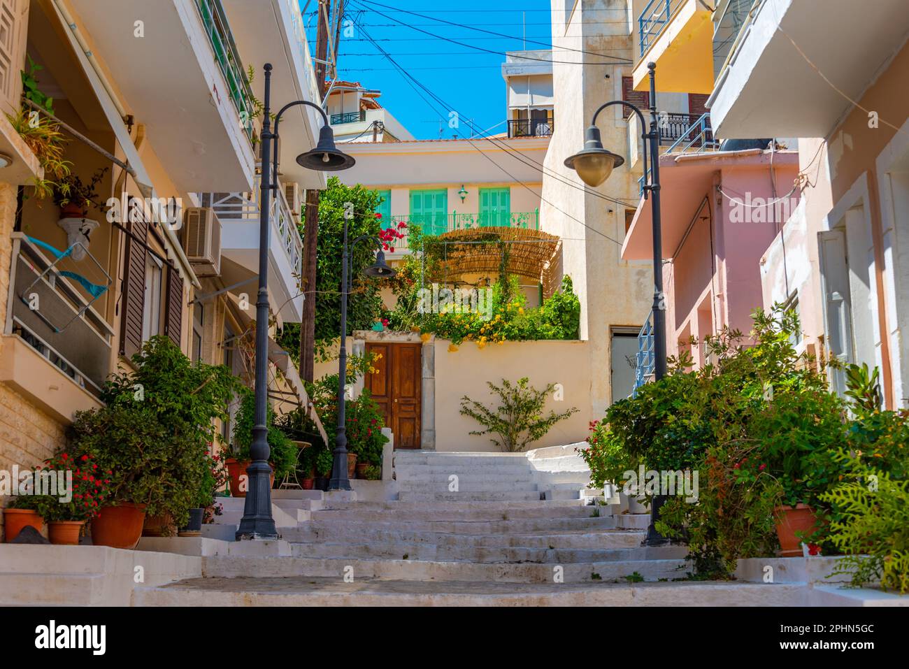 Narrow street in Greek town Sitia at Crete Stock Photo - Alamy