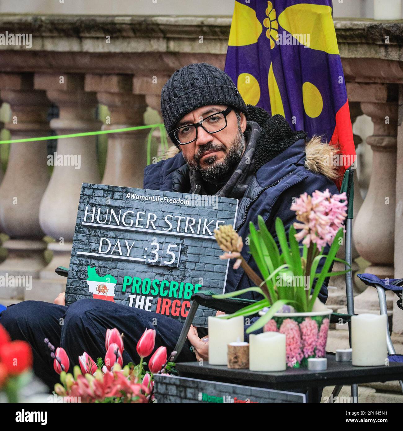 London, UK. 29th Mar, 2023. Beheshti sits among the flowers and gifts ...