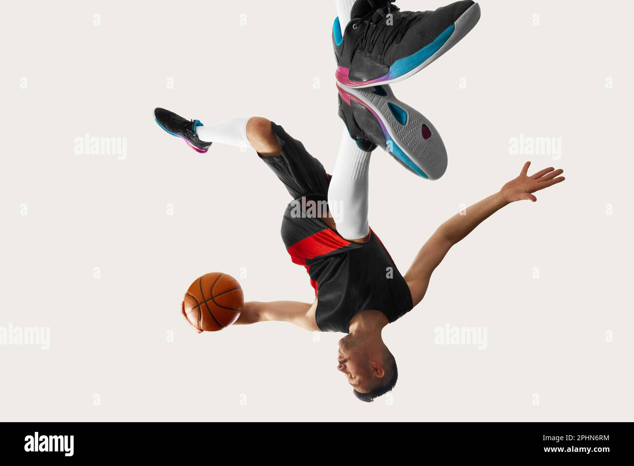 Shot of skillful basketball player wearing sport clothes and working ...