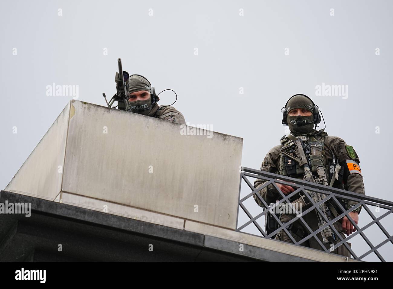 Berlin, Germany. 29th Mar, 2023. Snipers are at their post ahead of the ...