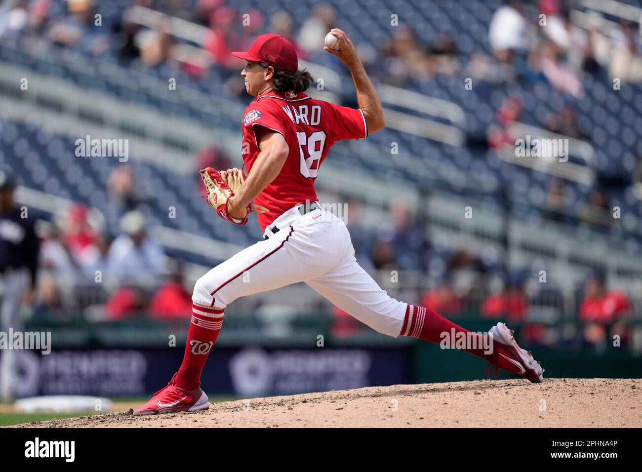 Washington Nationals starting pitcher Thad Ward throws to the New York ...