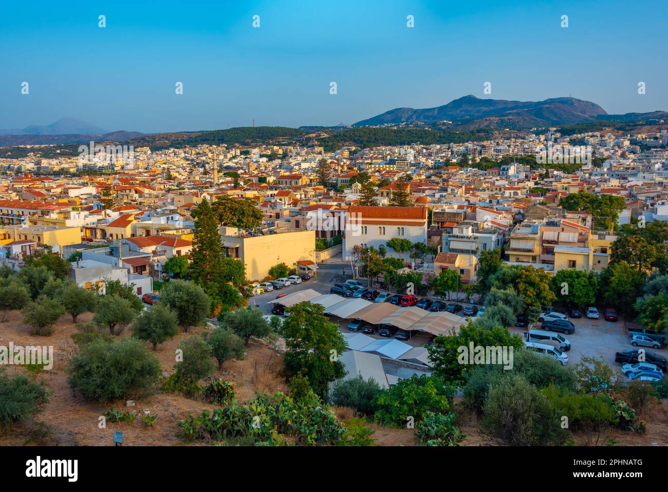 Sunset view of rooftops of Greek town Rethimno at Crete island Stock ...