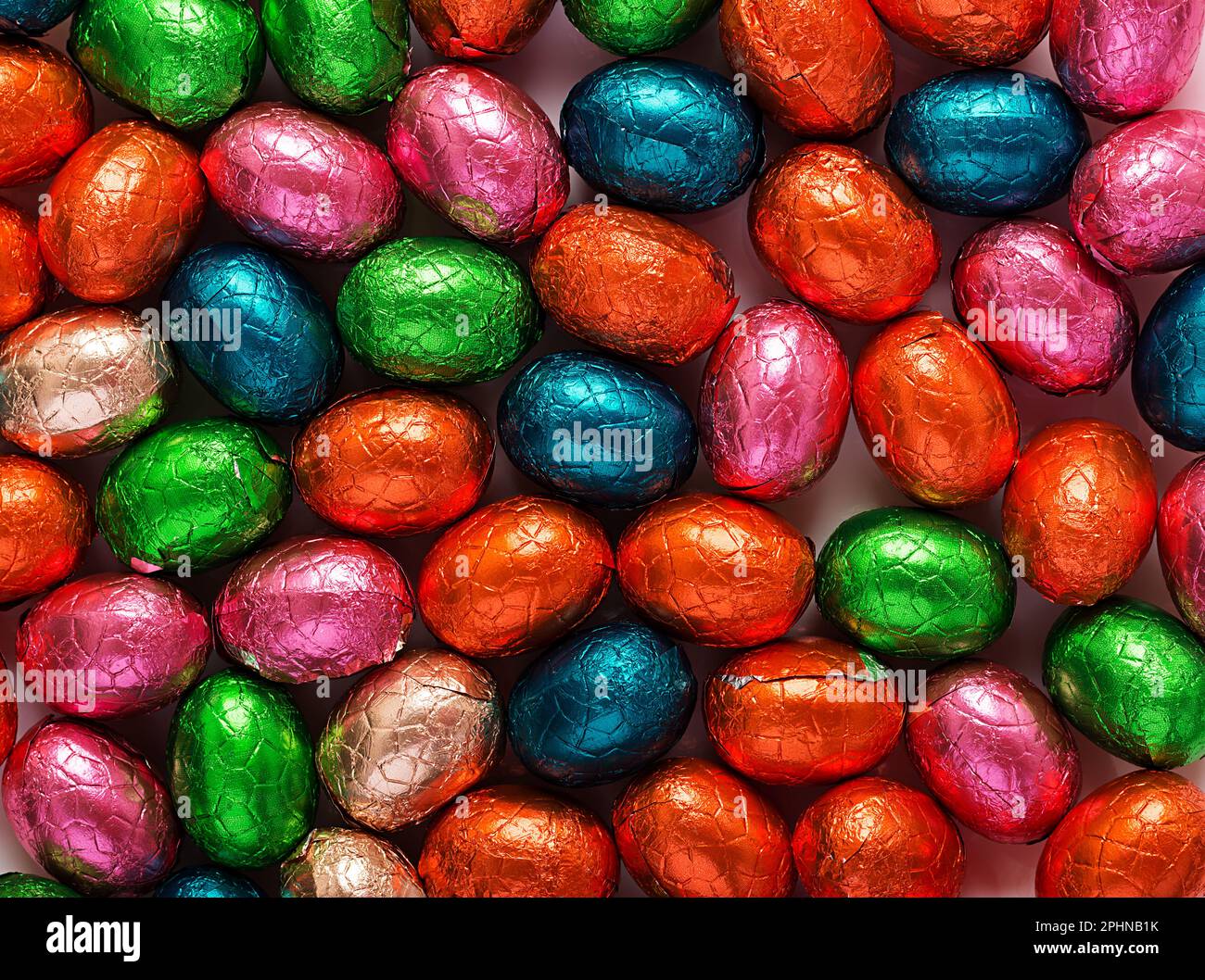 Colorful Easter eggs background. Chocolate Easter eggs texture. Top ...