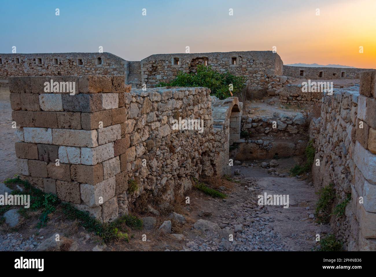 Sunset view of Venetian Fortezza Castle in Greek town Rethimno, Crete ...