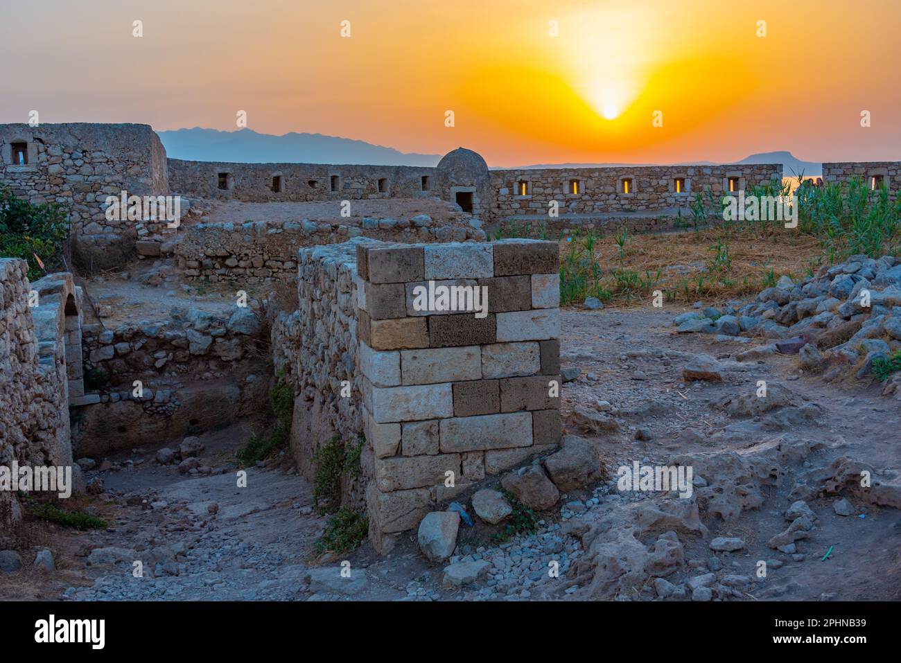 Sunset view of Venetian Fortezza Castle in Greek town Rethimno, Crete ...