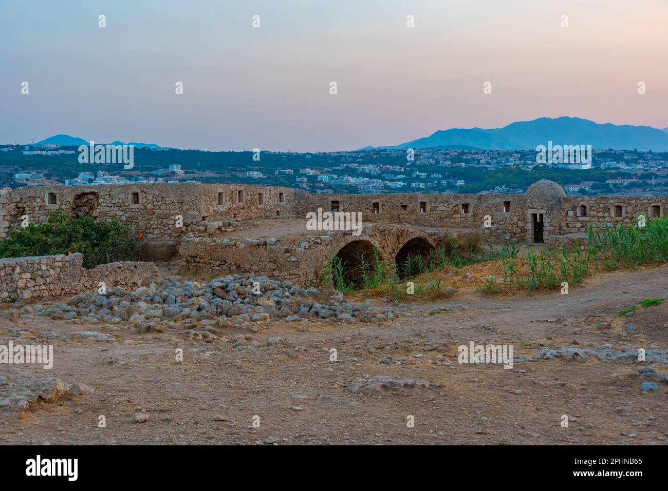 Sunset view of Venetian Fortezza Castle in Greek town Rethimno, Crete ...
