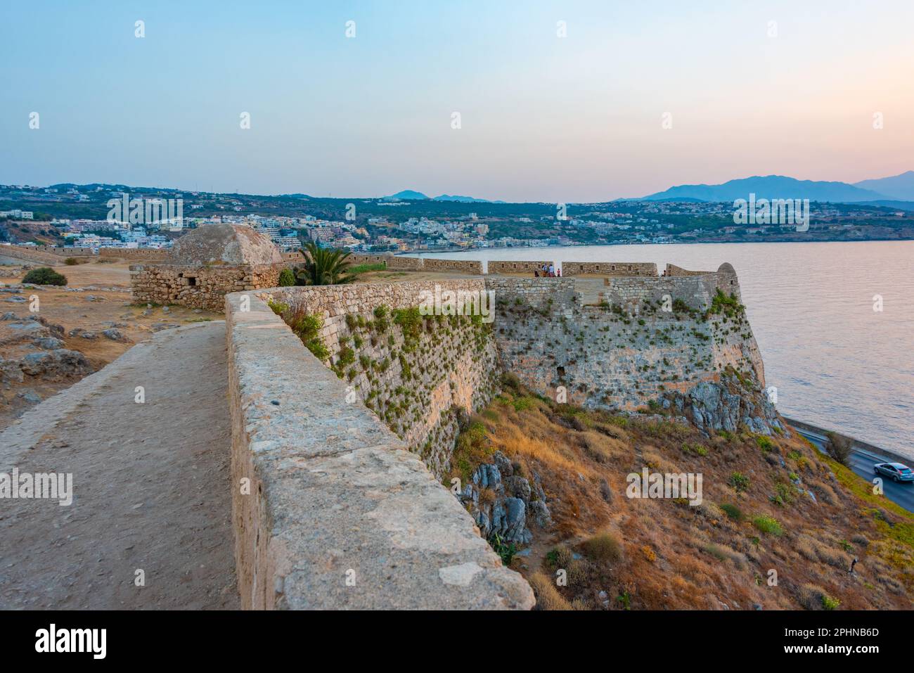 Sunset view of Venetian Fortezza Castle in Greek town Rethimno, Crete ...