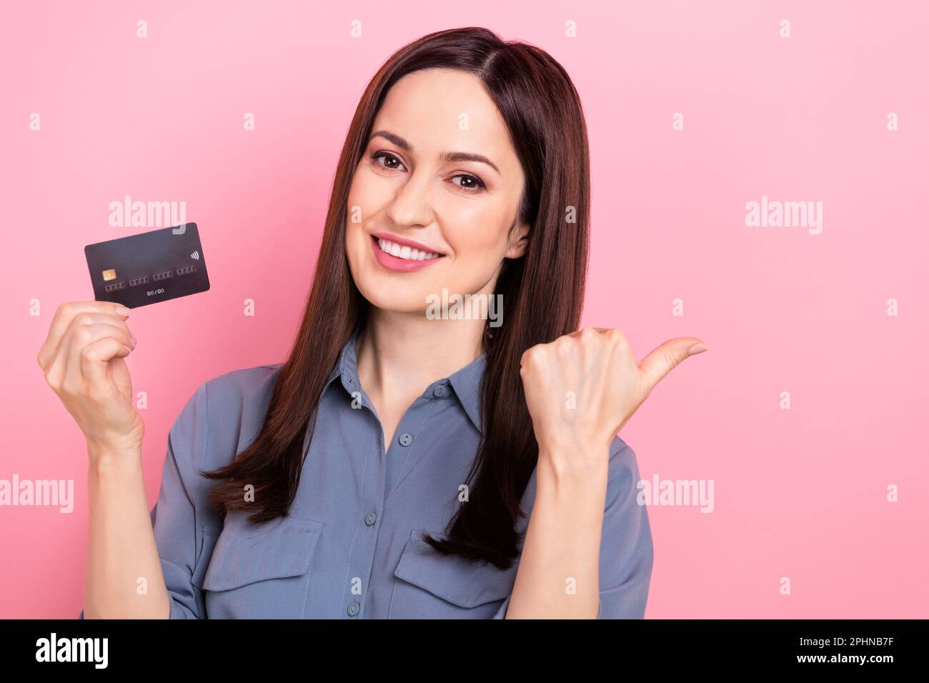 Photo of stunning glad lady wear trendy grey clothes arm direct empty space shopping transaction ...