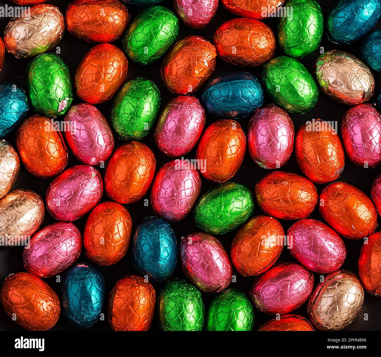 Colorful Easter eggs background. Chocolate Easter eggs texture. Top ...
