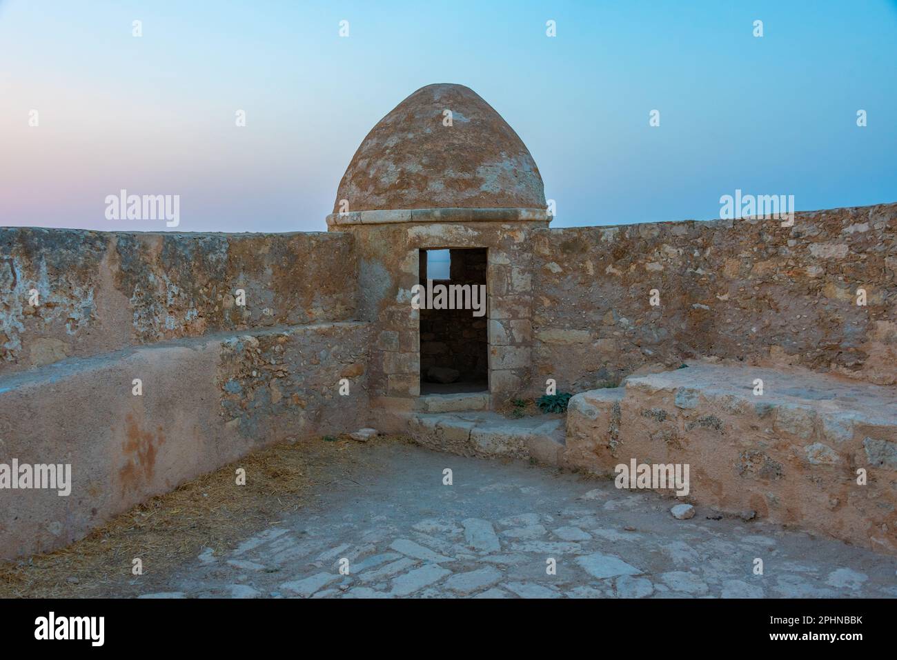 Sunset view of Venetian Fortezza Castle in Greek town Rethimno, Crete ...
