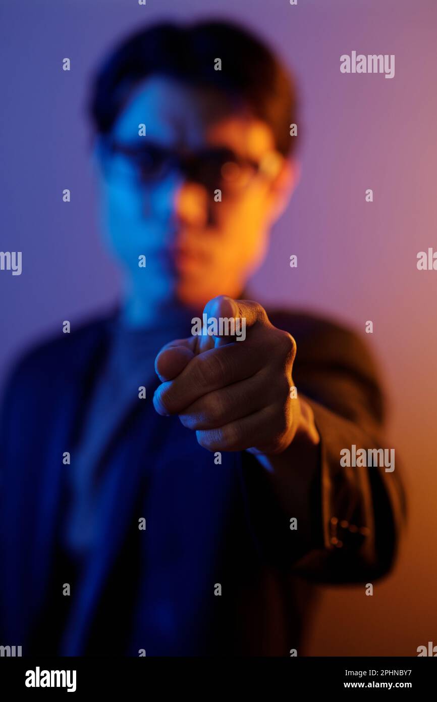 Serious man pointing at camera blaming viewer, focus on finger Stock ...